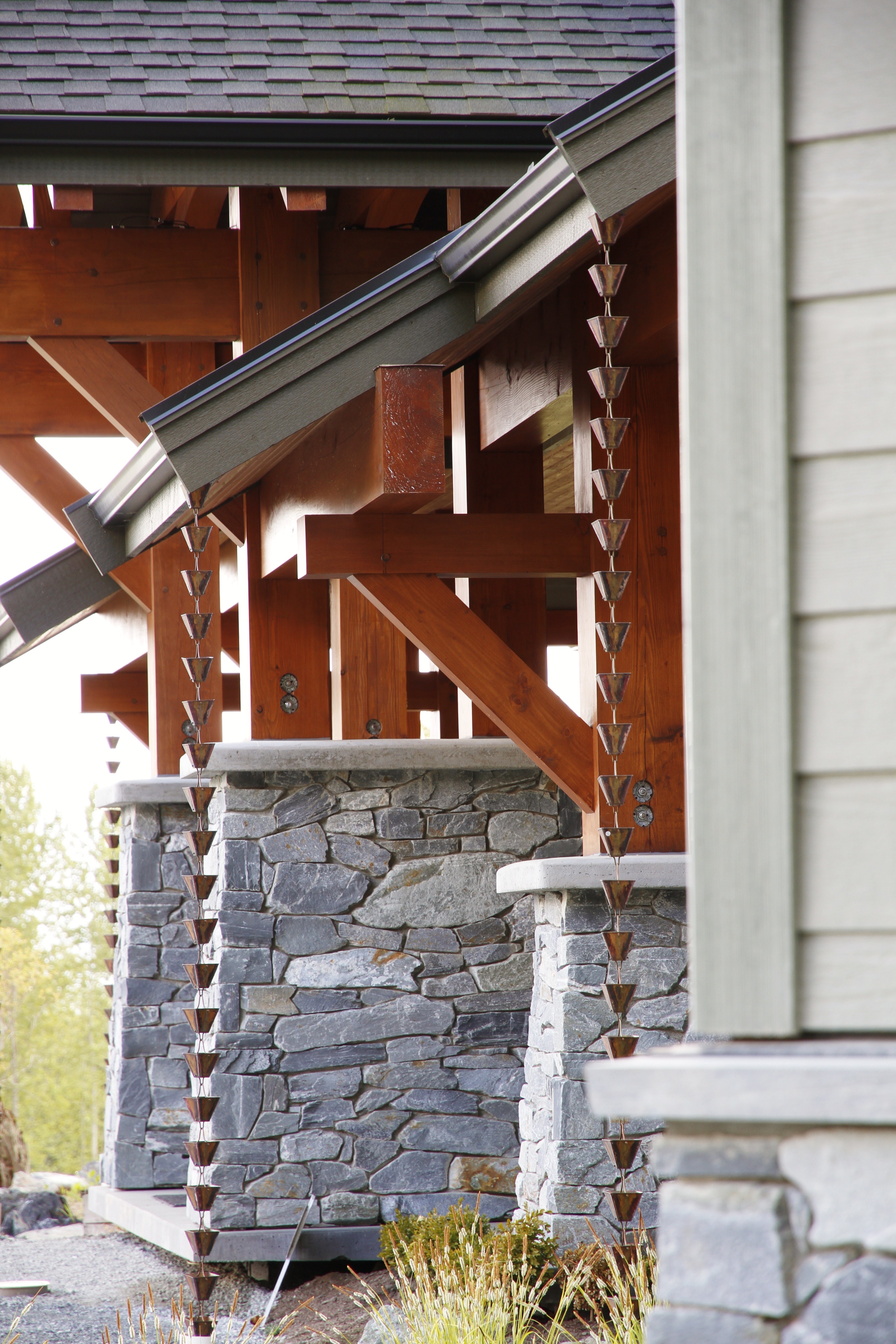 Timber Frame Overhang with Stone Posts | K2 Stone